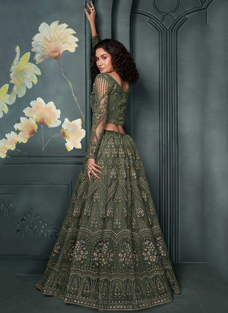 Buy Dazzling Dust Green Net Lehenga With Lavish Stone Embellishments ...